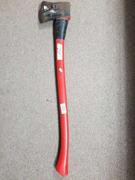 Spring-Loaded Chopper Axe With Red Handle and Black Grip - Trice Auctions