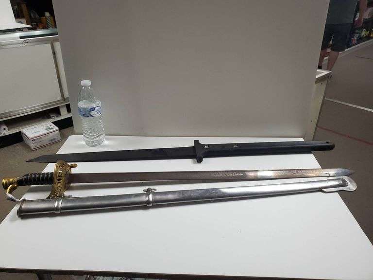 Pair of Swords with Sheath and Ornate Grip - Trice Auctions
