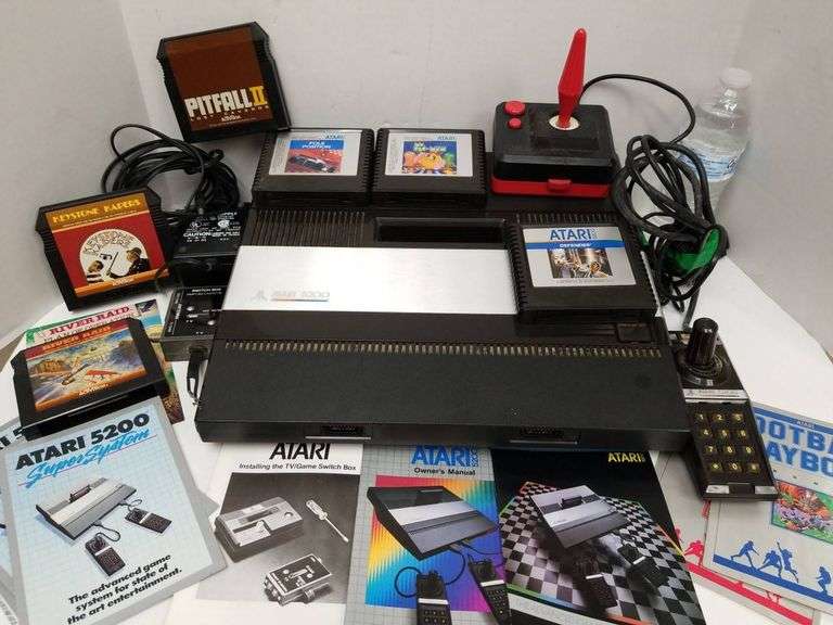 Atari 5200 Console with Games, Controllers, and Manuals - Trice Auctions