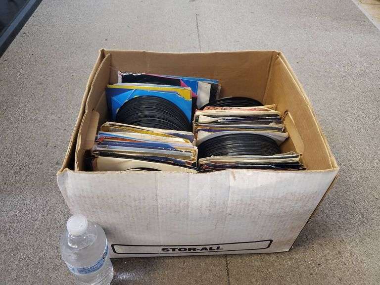 45 RPM Vinyl Records in Cardboard Box - Trice Auctions