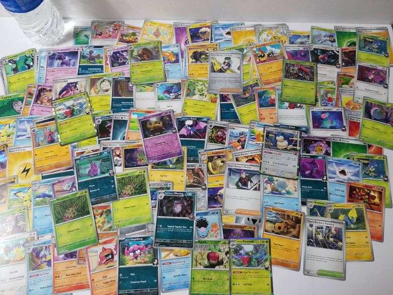 Pokemon Trading Cards with Holofoil Cards - Trice Auctions