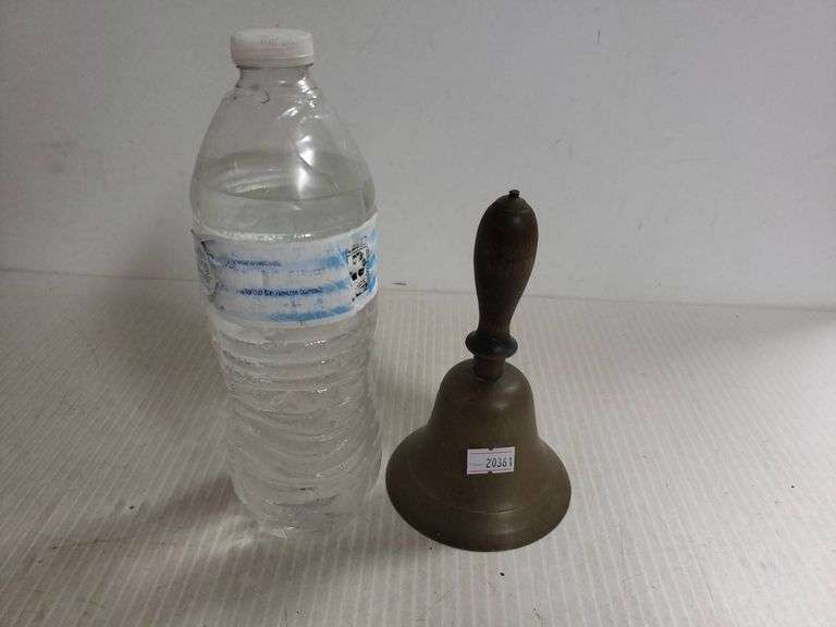 Bell with Metal Body and Handle Featuring Natural Material - Trice Auctions
