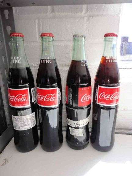 F3 LOT OF 4 COCA-COLA BOTTLES - Texas Online Auction House