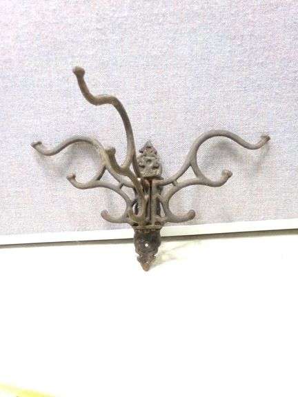 Rustic cast iron pivot hook coat rack - Texas Online Auction House