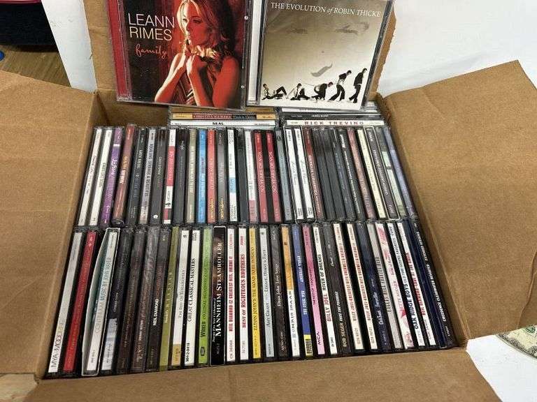 CD lot. More than 60 CDs. They all seem to be there. Zoom in to see the ...