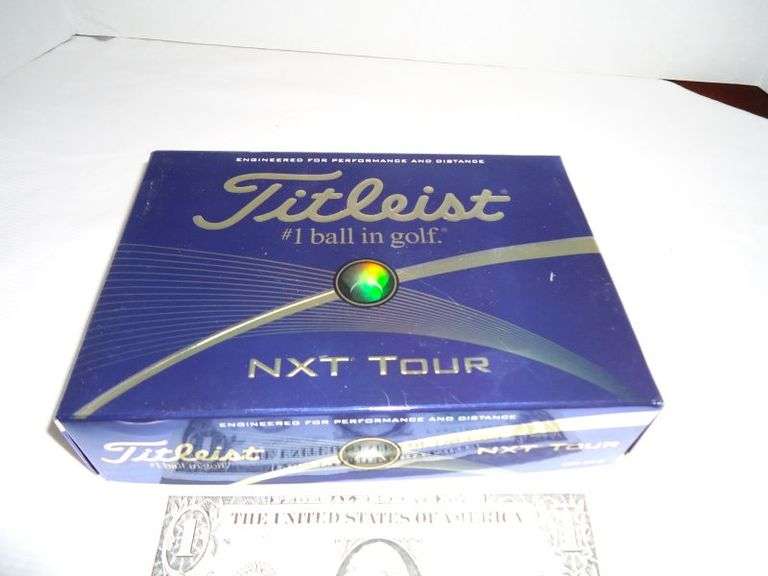 Cash only New box of 12 golf balls. - Texas Online Auction House