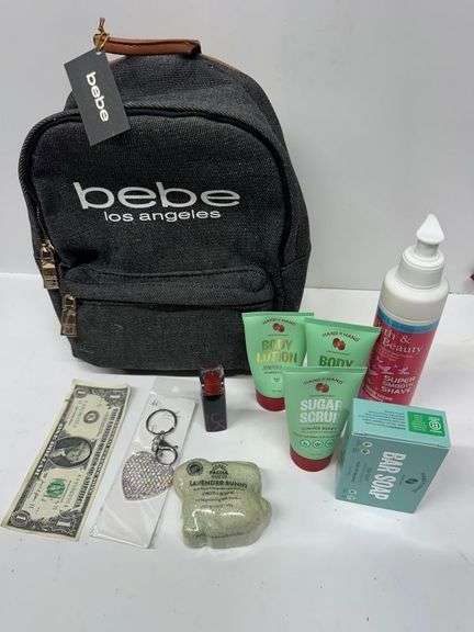 BEBE Backpack with tags. Comes with health and beauty products shown ...