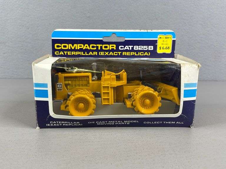 Caterpillar 825B Compactor, 1/50 Scale, Joal - United Edge Real Estate & Auction