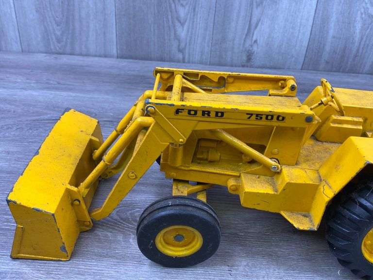 Ford 7500 Backhoe, 1/16, Missing Seat - United Edge Real Estate & Auction