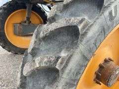 Hagie STS 14 Upfront 120’ boom sprayer - United Edge Real Estate & Auction