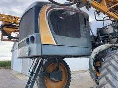 Hagie STS 14 Upfront 120’ boom sprayer - United Edge Real Estate & Auction