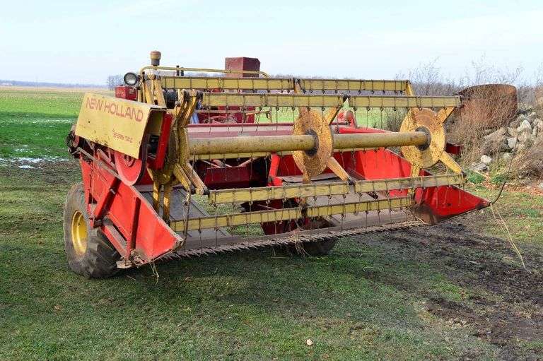 New Holland 903 Swather - Shackelton Auctions Inc.