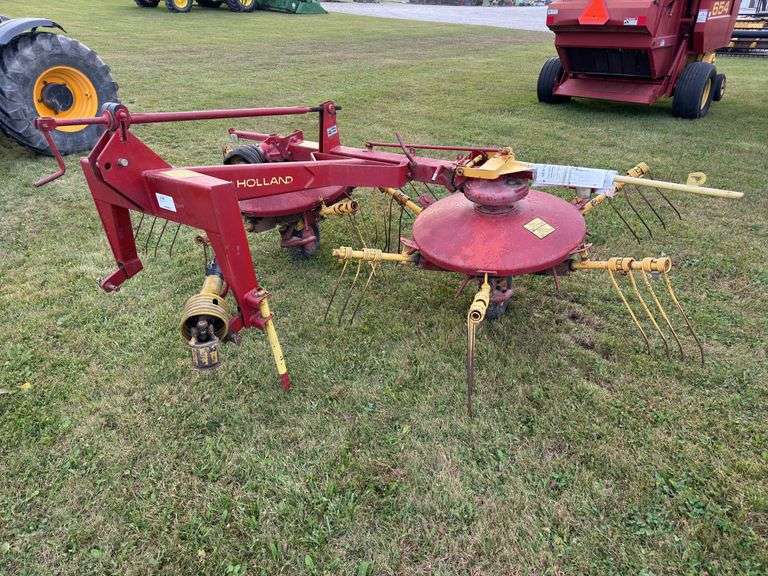 NEW HOLLAND 254 2 ROTOR HAY RAKE - Shackelton Auctions Inc.