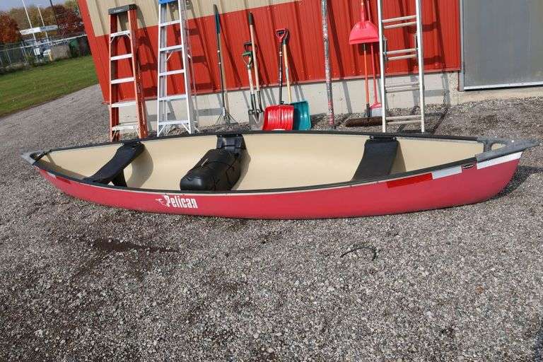 PELICAN 14' PLASTIC CANOE - Shackelton Auctions Inc.