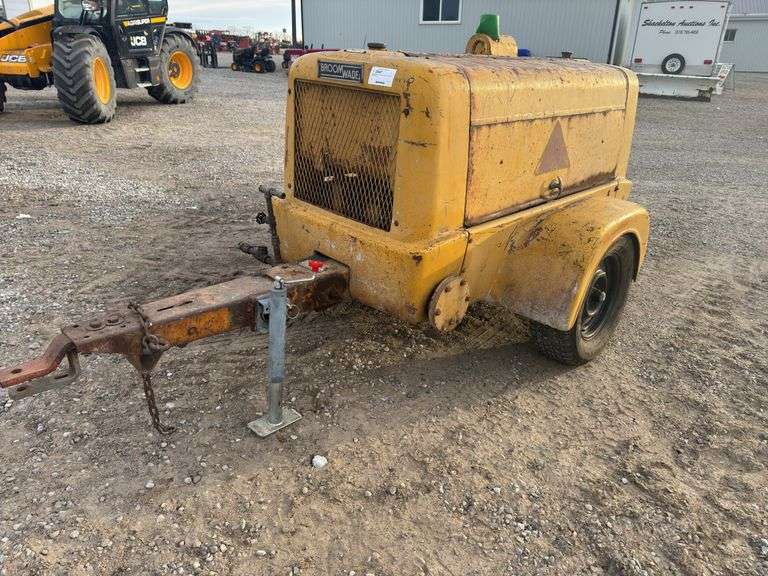 BROOMWADE GAS TOW BEHIND PORTABLE AIR COMPRESSOR - Shackelton Auctions Inc.