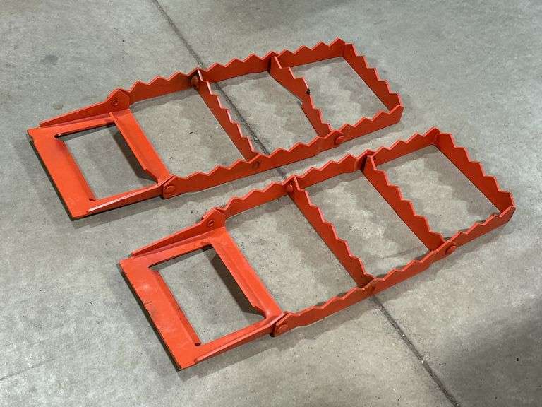 2 FOLDING STEEL TRACTION AIDS - Shackelton Auctions Inc.