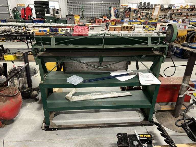 GRIZZLY 48" METAL BRAKE - Shackelton Auctions Inc.