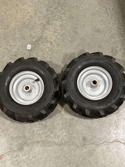 2 CARLISLE 13X5.00-6 NHS TIRES WITH RIMS - Shackelton Auctions Inc.