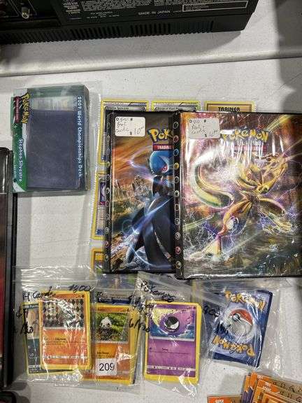 ASSORTED POKEMON CARDS & HOLDERS - Shackelton Auctions Inc.