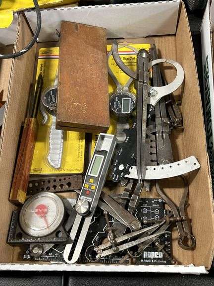 BOX OF ASSORTED MEASURING TOOLS - Shackelton Auctions Inc.