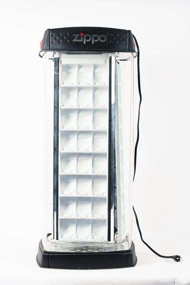 ZIPPO PLASTIC LIGHTED REVOLVING DISPLAY CASE - Shackelton Auctions Inc.