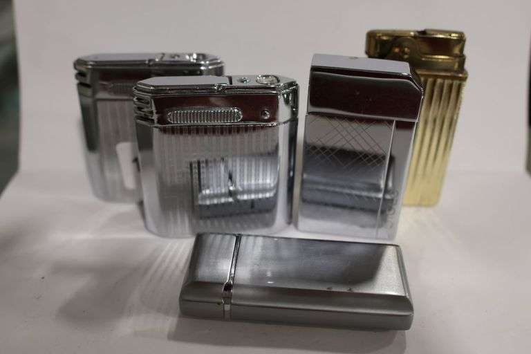 7 VINTAGE POCKET LIGHTERS - Shackelton Auctions Inc.