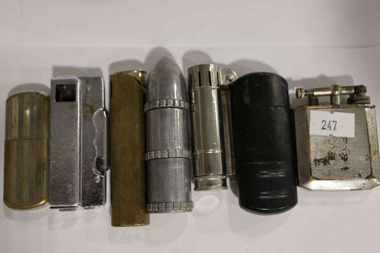 7 VINTAGE POCKET LIGHTERS - Shackelton Auctions Inc.