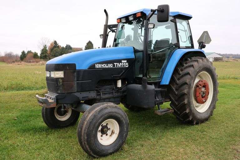 2001 NEW HOLLAND TM115 2WD TRACTOR - Shackelton Auctions Inc.