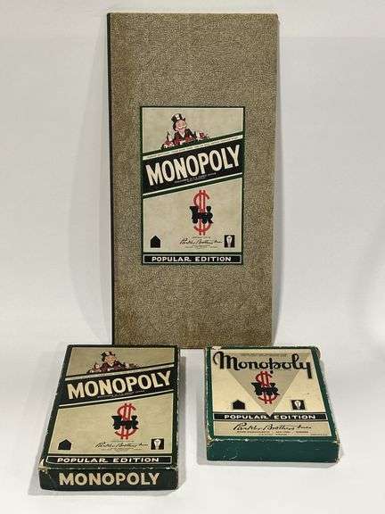 2 BOXES OF MONOPOLY GAME PEICES & 1 GAME BOARD - Shackelton Auctions Inc.