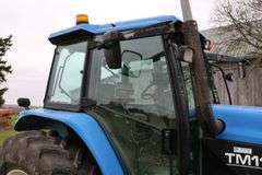 2001 NEW HOLLAND TM115 2WD TRACTOR - Shackelton Auctions Inc.