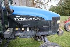 2001 NEW HOLLAND TM115 2WD TRACTOR - Shackelton Auctions Inc.