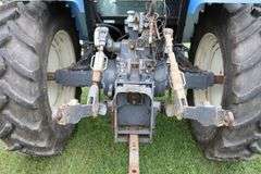 2001 NEW HOLLAND TM115 2WD TRACTOR - Shackelton Auctions Inc.