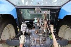 2001 NEW HOLLAND TM115 2WD TRACTOR - Shackelton Auctions Inc.
