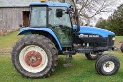 2001 NEW HOLLAND TM115 2WD TRACTOR - Shackelton Auctions Inc.