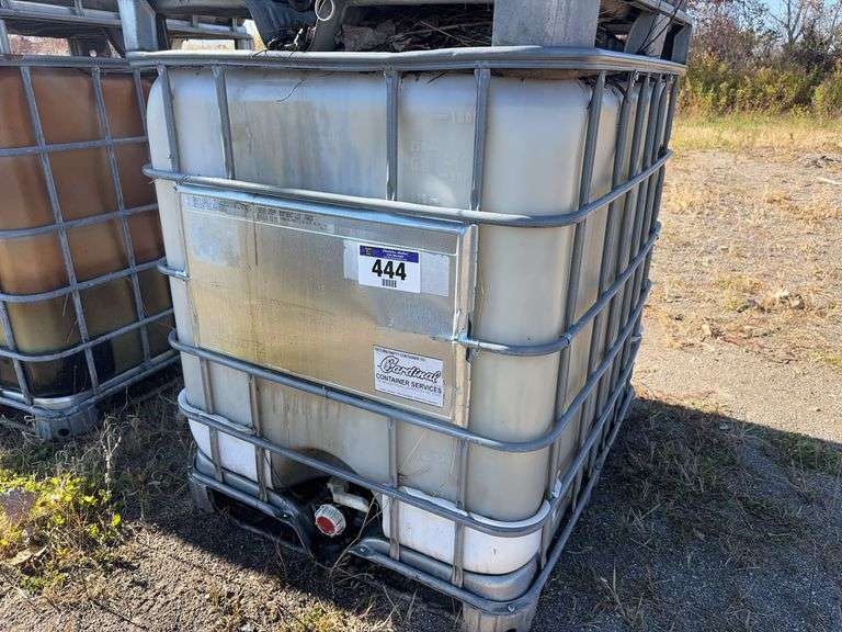 1000 LITRE CAGED POLY TOTE - USED FOR USED OIL - Shackelton Auctions Inc.