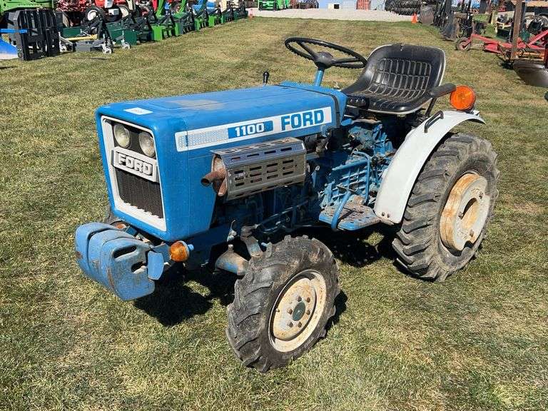 FORD 1100 4WD COMPACT TRACTOR - Shackelton Auctions Inc.