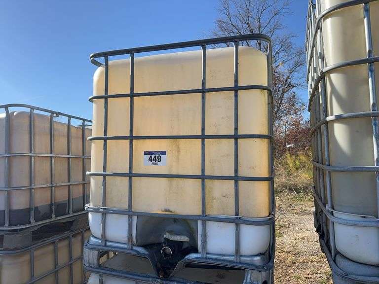 1000 LITRE CAGED POLY TOTE - USED FOR USED OIL - Shackelton Auctions Inc.