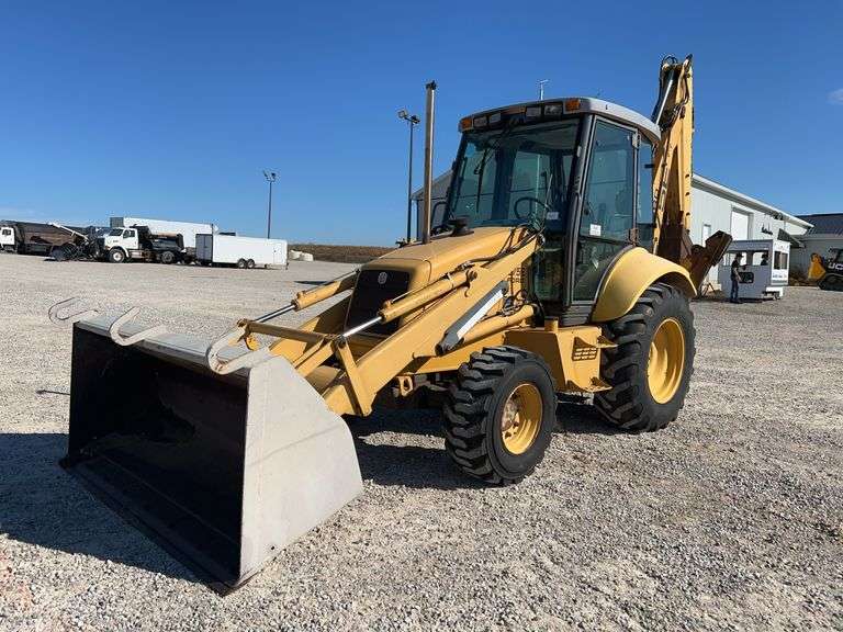2000 FORD NEW HOLLAND 575E TRACTOR LOADER BACKHOE - Shackelton Auctions ...