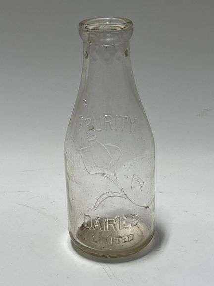 PURITY DAIRIES QUART MILK BOTTLE - Shackelton Auctions Inc.