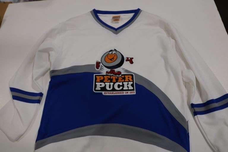 BOX OF HOCKEY TINS & PETER PUCK JERSEY - Shackelton Auctions Inc.