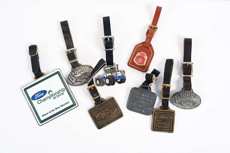 GROUP OF 8 FORD WATCH FOBS - Shackelton Auctions Inc.