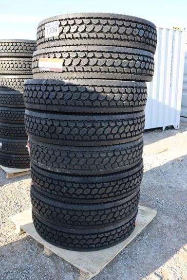 8 - 11R22.5 16 PLY DRIVE TIRES - CLOSED SHOULDER - Shackelton Auctions Inc.