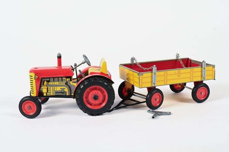 TIN WIND-UP TRACTOR WITH WAGON - Shackelton Auctions Inc.