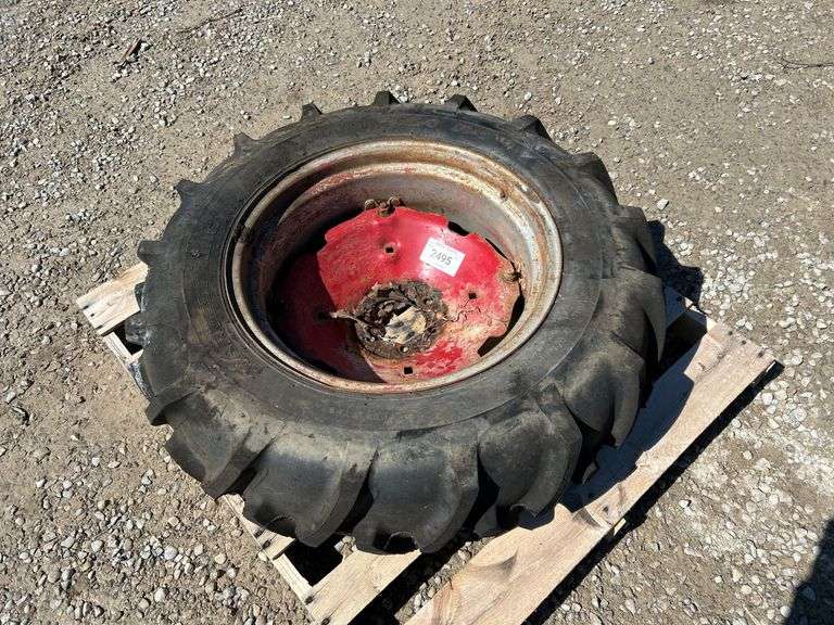 1 - 11.2X24 TIRE & RIMS - Shackelton Auctions Inc.