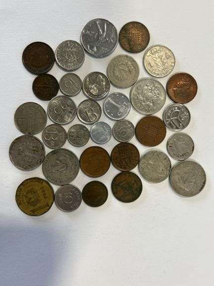 LOT OF ASSORTED COINS FROM VARIOUS COUNTRIES - Shackelton Auctions Inc.