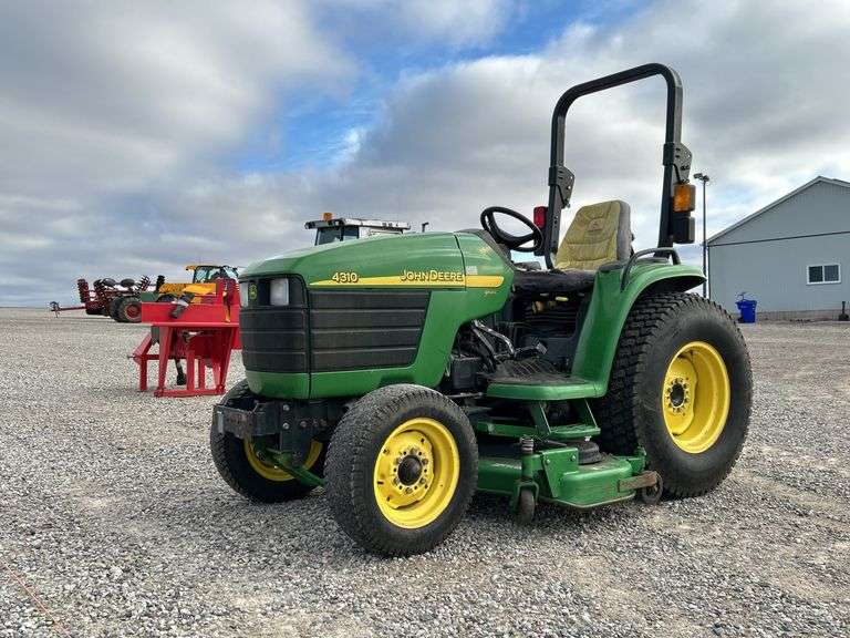 JOHN DEERE 4130 2WD MOWER - Shackelton Auctions Inc.