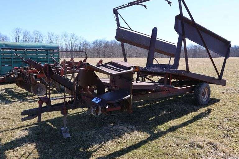 NEW HOLLAND STACKING BALE WAGON - Shackelton Auctions Inc.