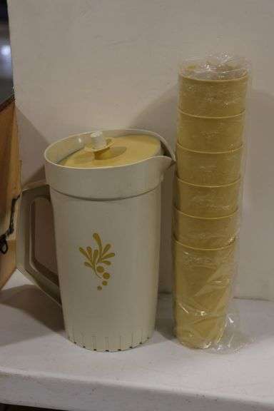 TUPPERWARE PITCHER AND NEW TUPPERWARE CUPS - Shackelton Auctions Inc.