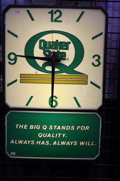 QUAKER STATE LIGHTES PLASTIC WALL CLOCK - Shackelton Auctions Inc.