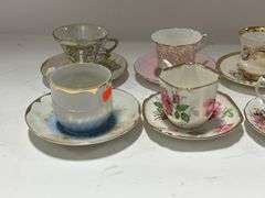 EIGHT ASSORTED TEA CUPS AND SAUCERS - Shackelton Auctions Inc.